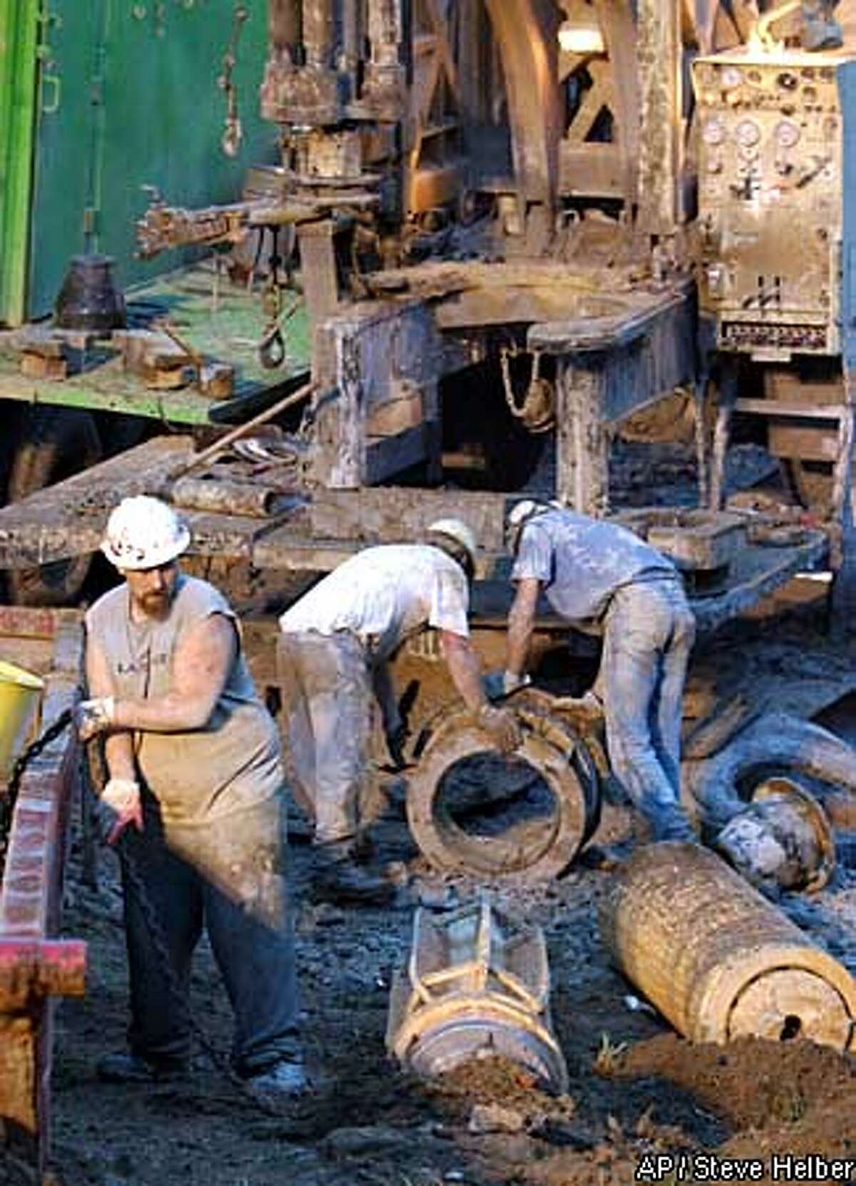 Hoping for a rescue / 9 trapped miners silent as broken bit causes long ...