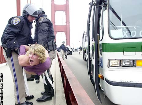 Anti-war rally ties up bridge / Cops stop traffic to make arrests at ...
