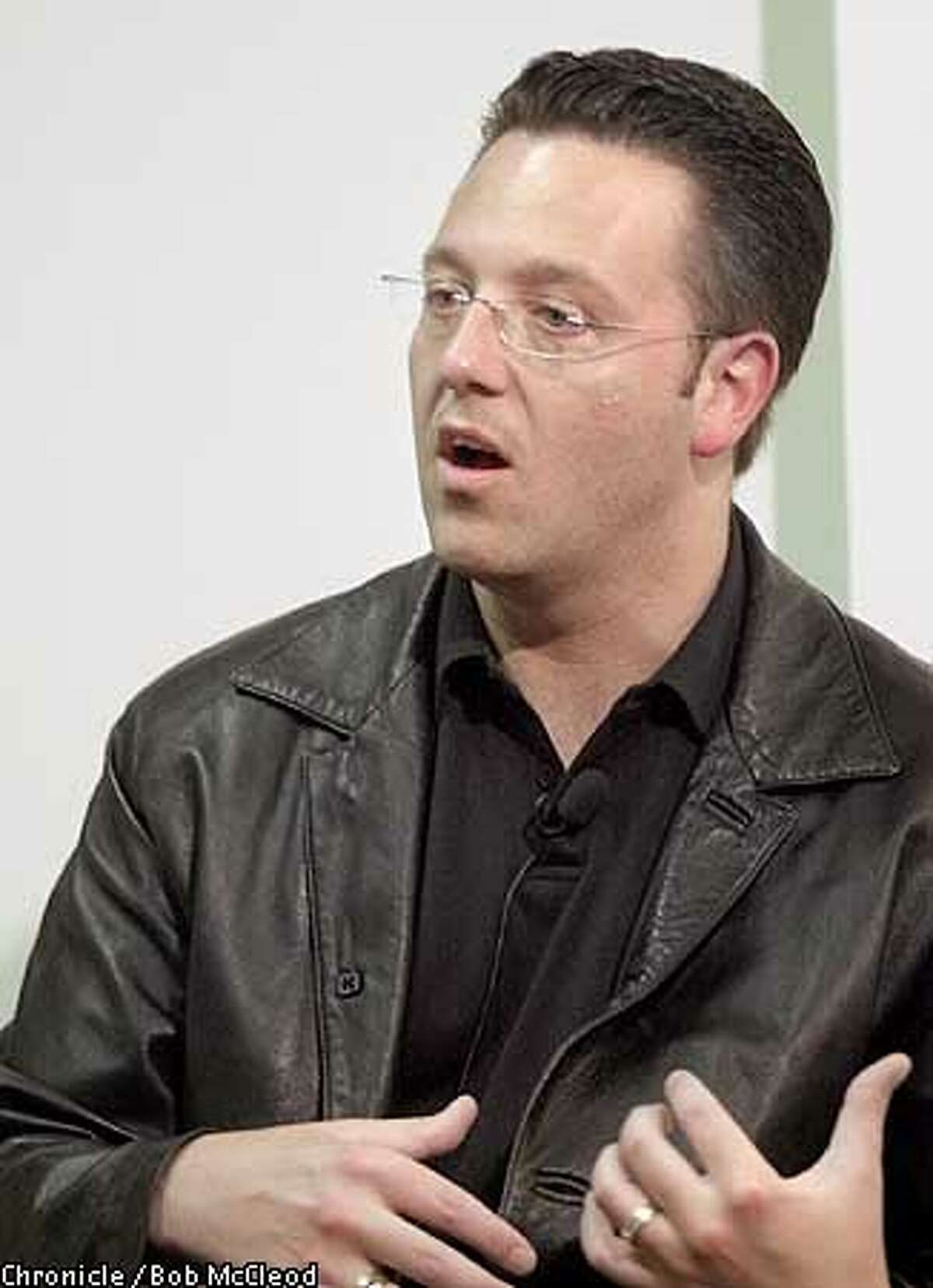 Medium with a message / 'Crossing Over' with John Edward requires leap ...