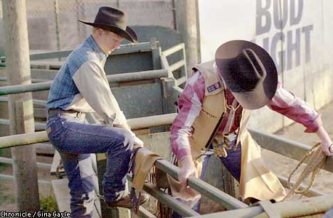 Hooked on rodeo / Bone-crushing, twisting bulls don't faze these four ...