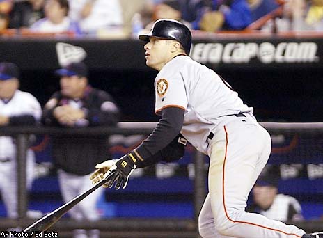 Rueter gets best of buddy / Giants' lefty out-duels Estes for 100th win