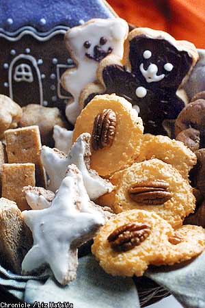 Cookie extravaganza / Bay Area professionals bake up a holiday tradition