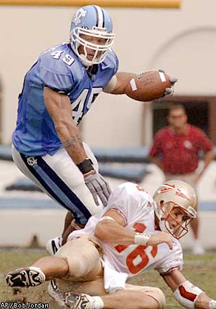 2002 NFL DRAFT / PEPPERS / With Carr locked up as top overall pick ...