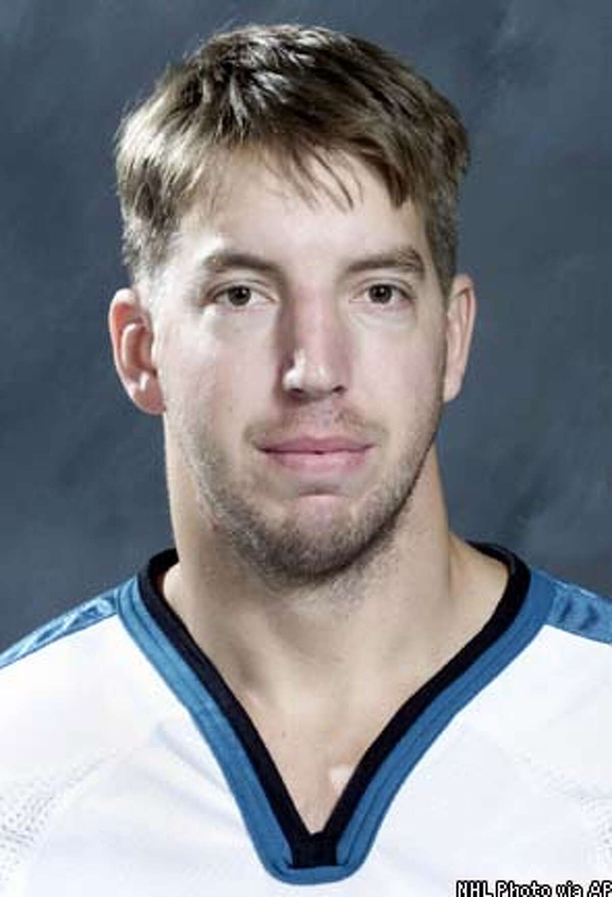 Rathje, Sharks come to terms