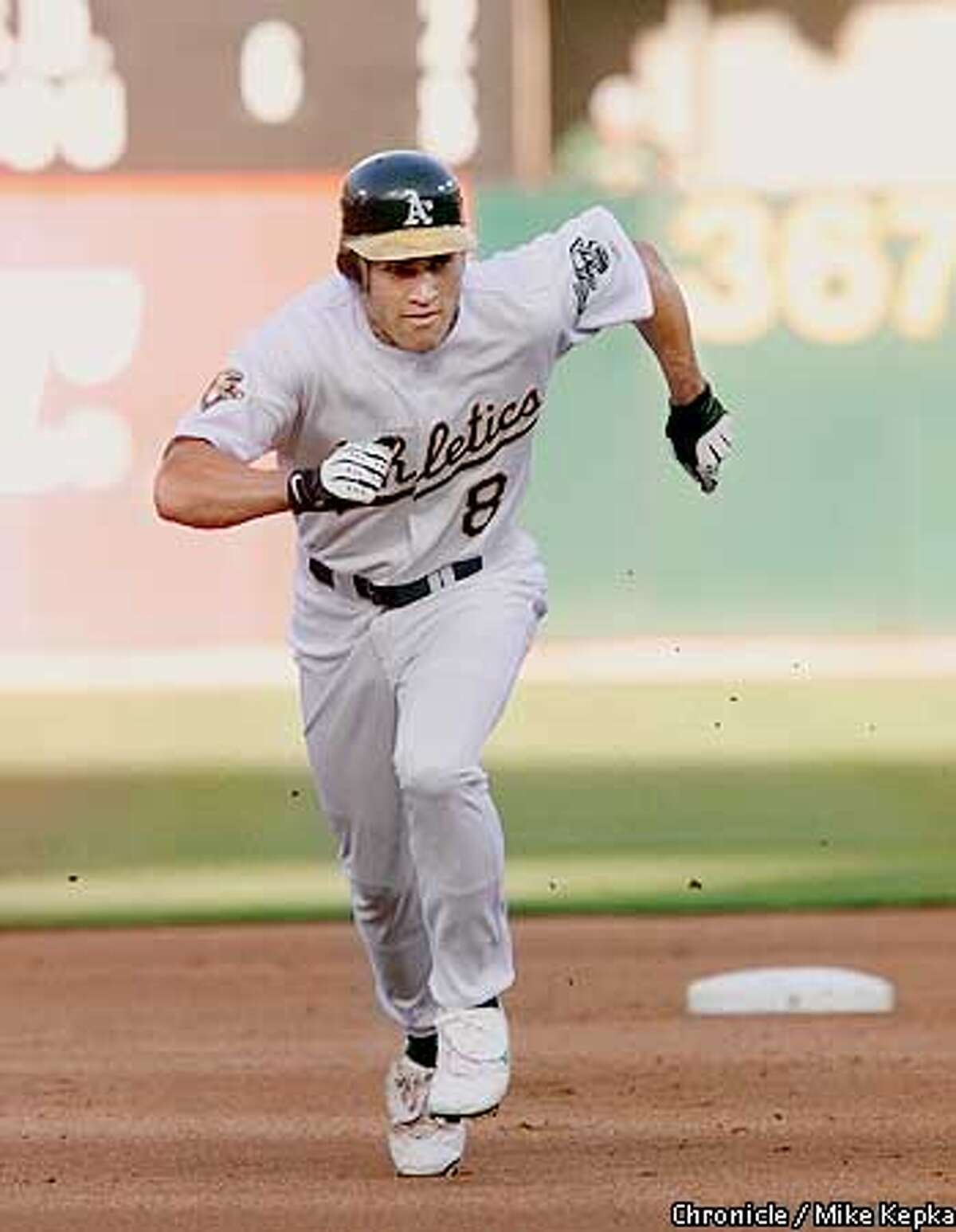 Damon adjusts his stance / Return to A's won't hinge on Giambi