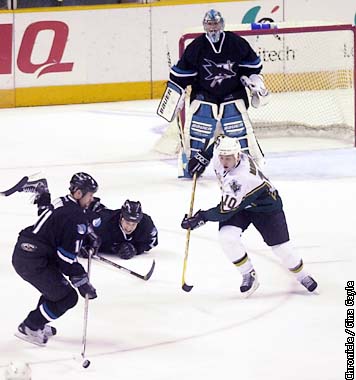 Sharks, Marleau rise to occasion / San Jose regains sole possession of 1st