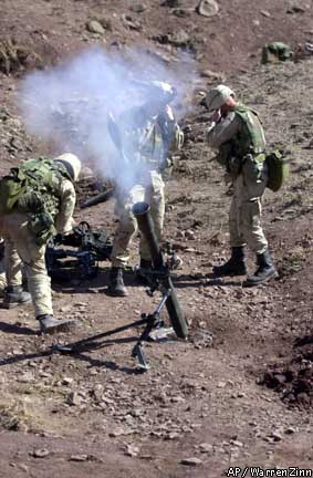 U.S.-led troops fight close to enemy strongholds / Al Qaeda, Taliban ...