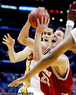 Stanford out, Cal moves on / USC bounces Cardinal with total beating