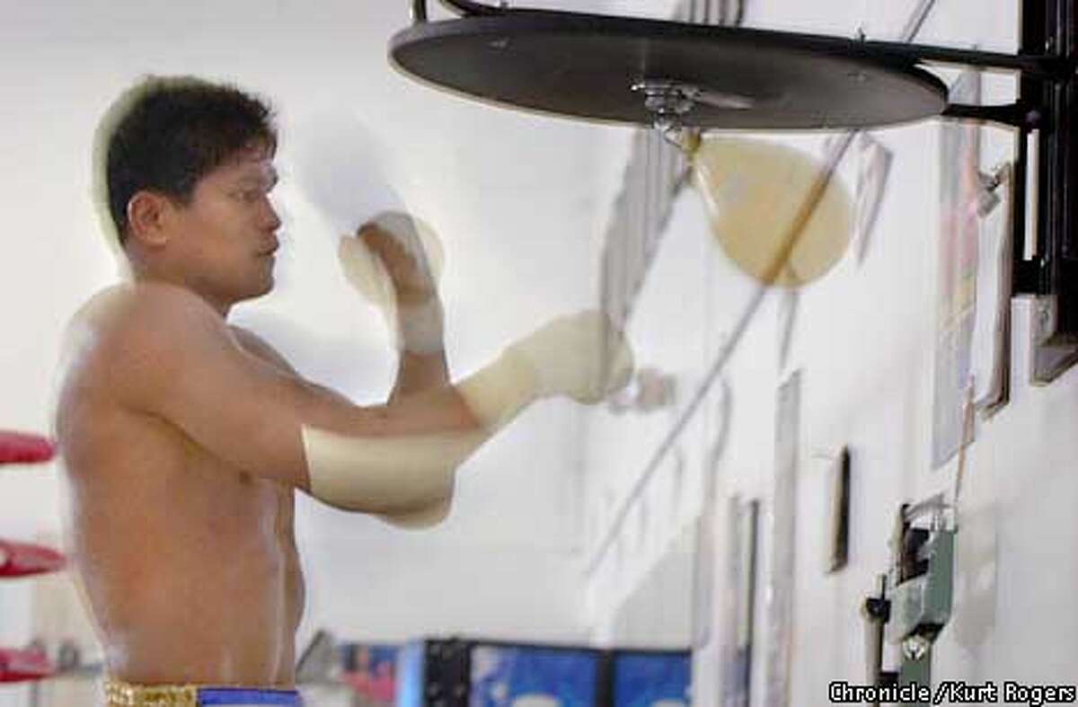 Fighting back / At 34, two-time world champion Luisito Espinosa is ...