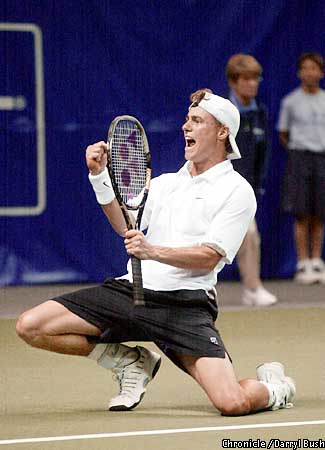 Hewitt wins battle of ages / No. 1 youngster wins Siebel, denies Agassi ...