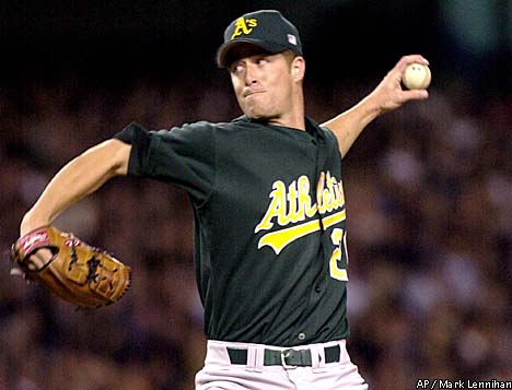 A's turn on the power / Three homers back Mulder's solid outing