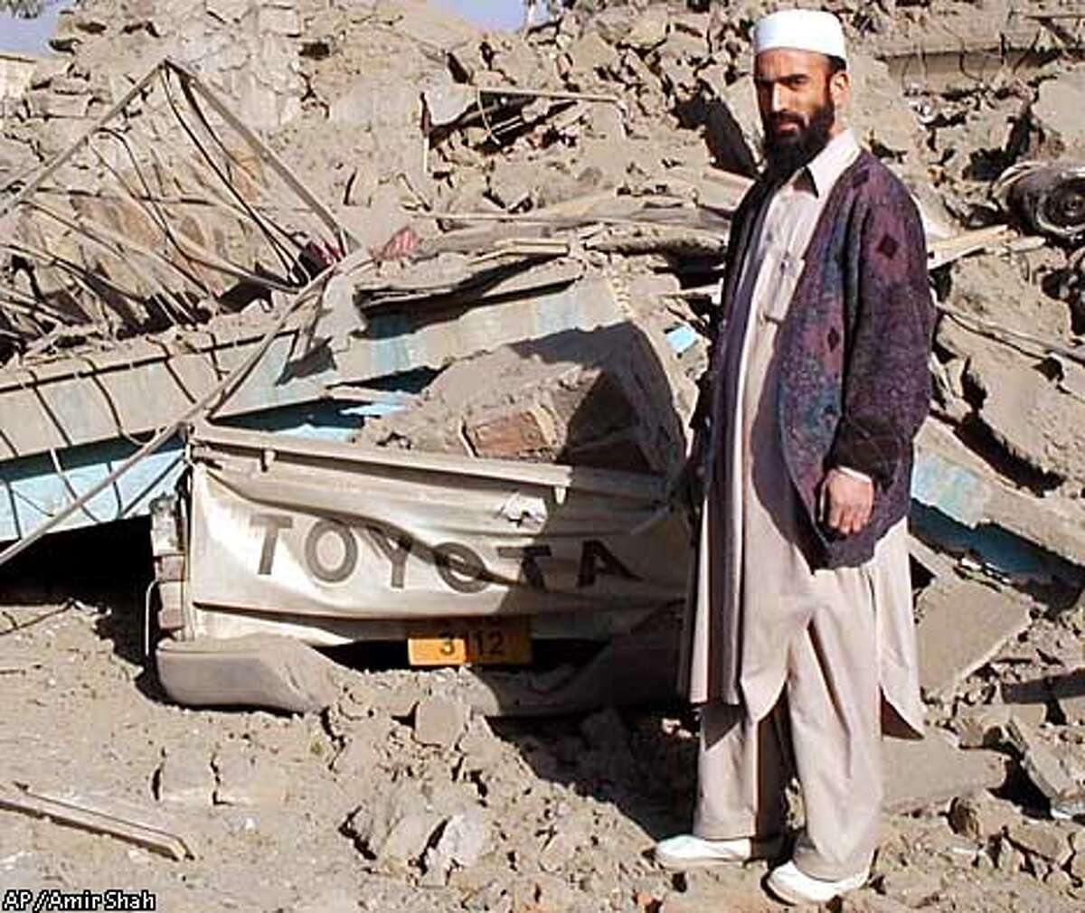 Few targets left / Taliban defenses flattened -- 4 U.N. guards die when ...