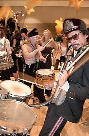 Party animals / Extra Action Marching Band knows how to get on the good ...