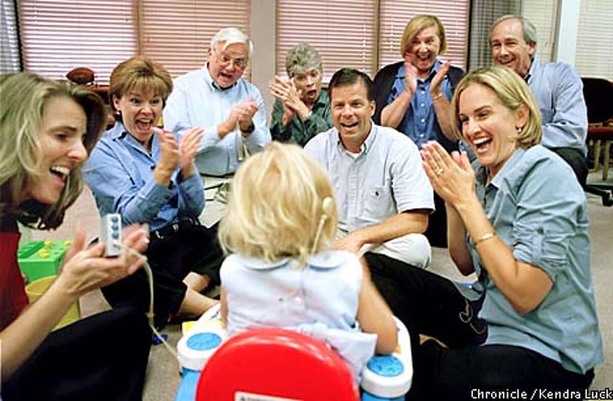 A family transformed / Deaf father, mother and daughter gain hearing ...