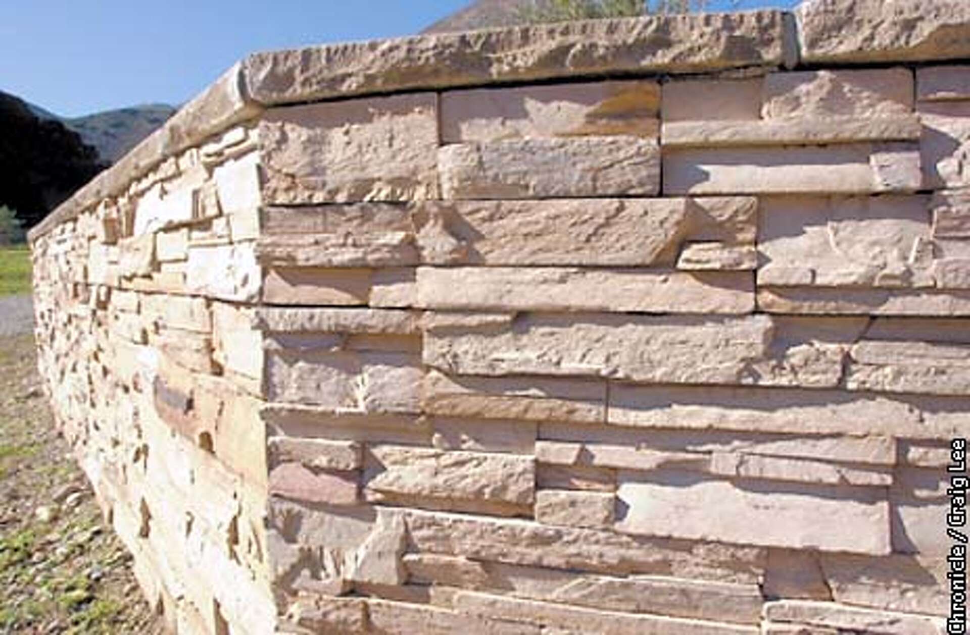 Building a wall / Practical fake stone -- fine art or faux pas?