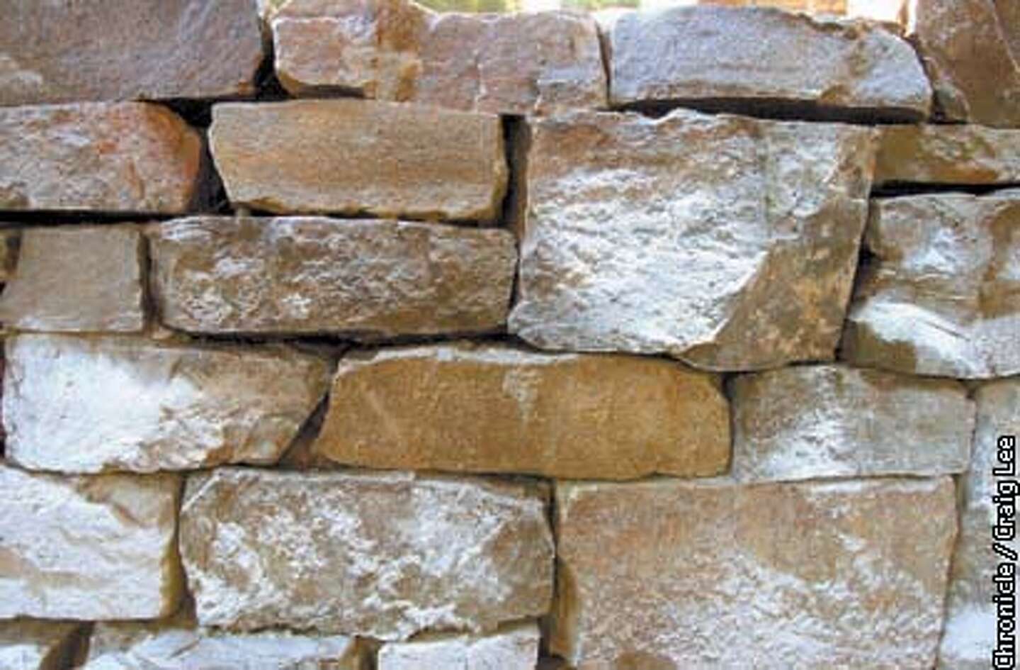 Building a wall / Practical fake stone -- fine art or faux pas?