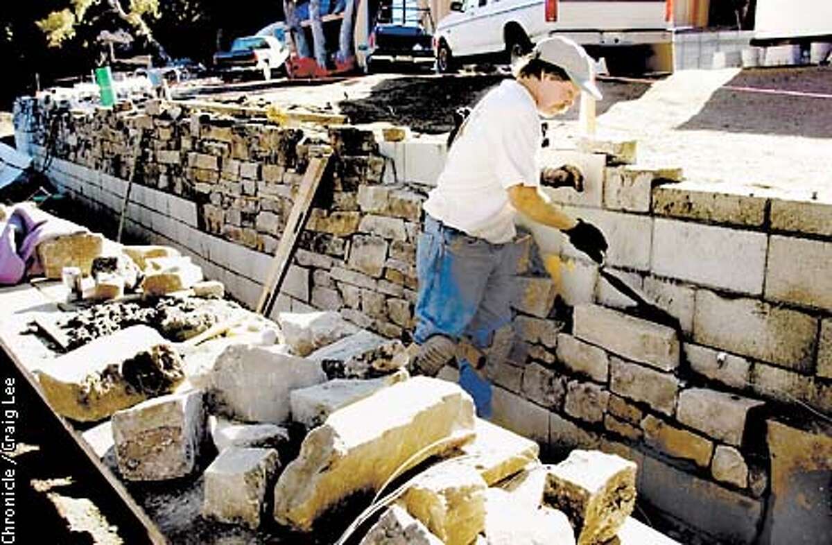 Building a wall / Practical fake stone -- fine art or faux pas?