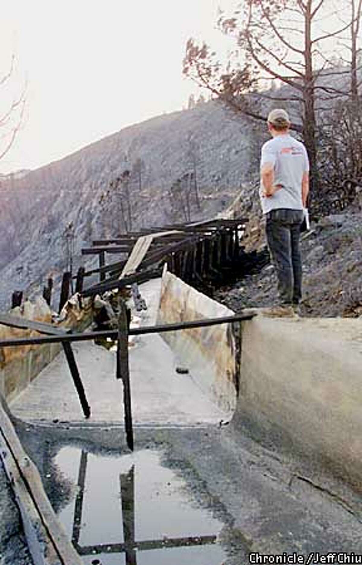 Calaveras canyon fire leaves towns high and dry / Wooden aqueduct a ...