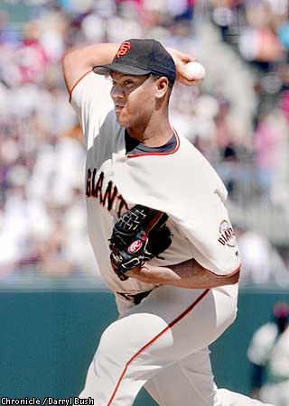 Hernandez stands tall / Giants pitcher silences Rockies over 7 innings