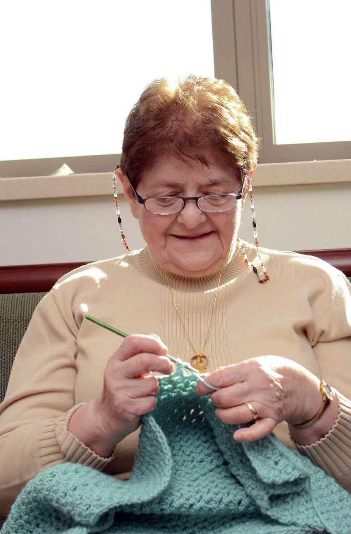 Volunteers create special gifts for cancer patients