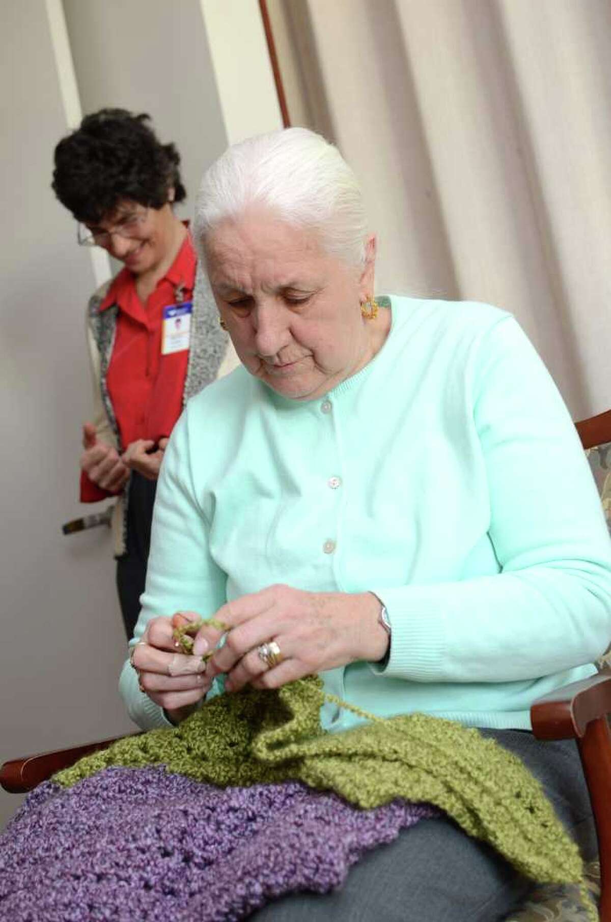 Volunteers create special gifts for cancer patients