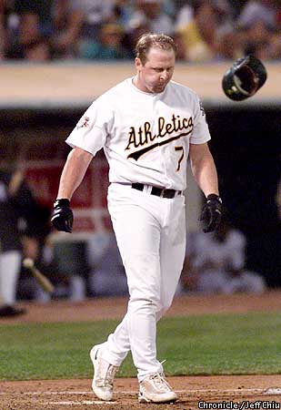 Lowly Tigers rip A's, Hudson / Loss leaves Oakland game ahead of Boston