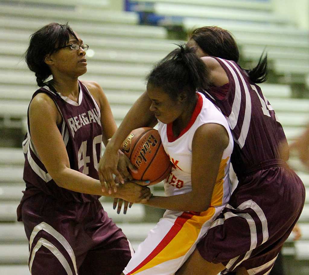 Reagan girls press way past Yates in 21-4A hoops