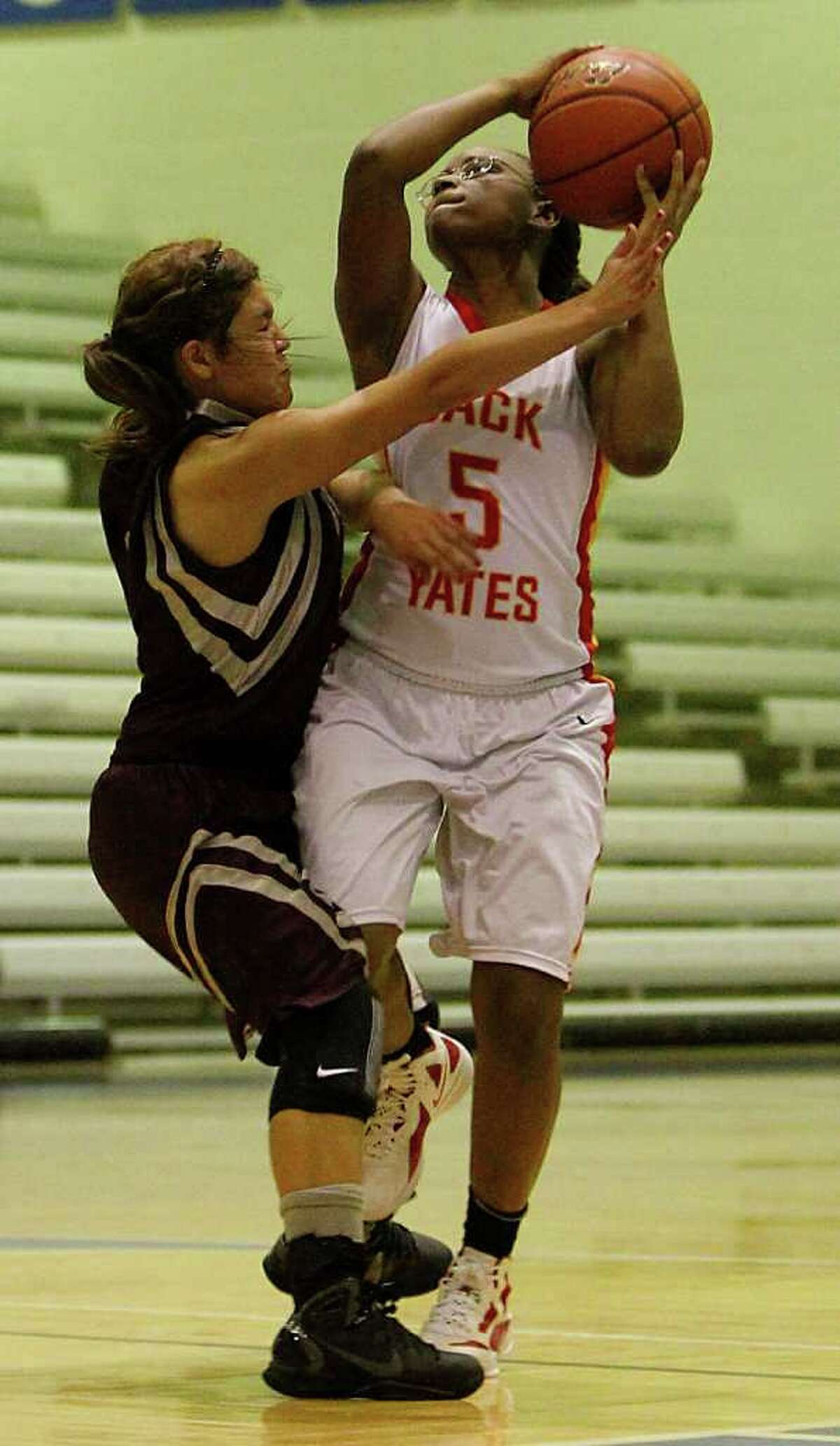 Reagan girls press way past Yates in 21-4A hoops