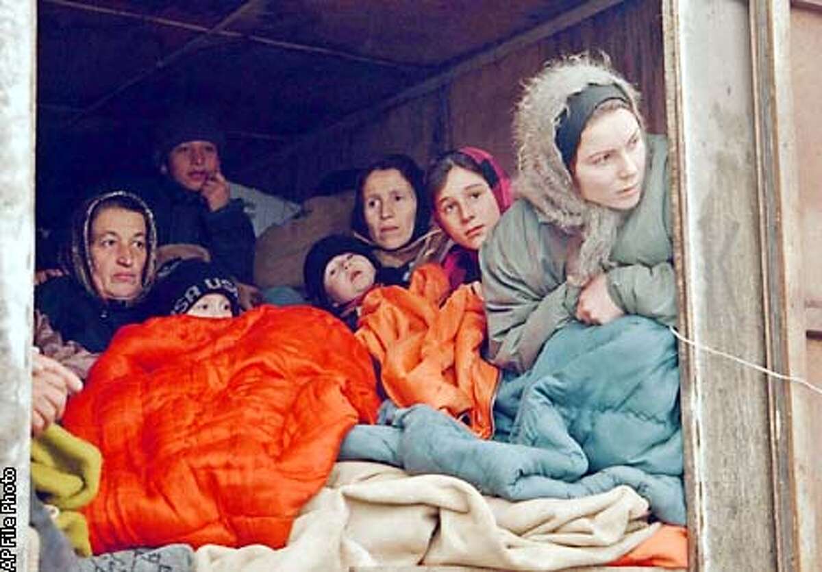 The calamity in Chechnya / Russian journalist powerfully recounts a war ...