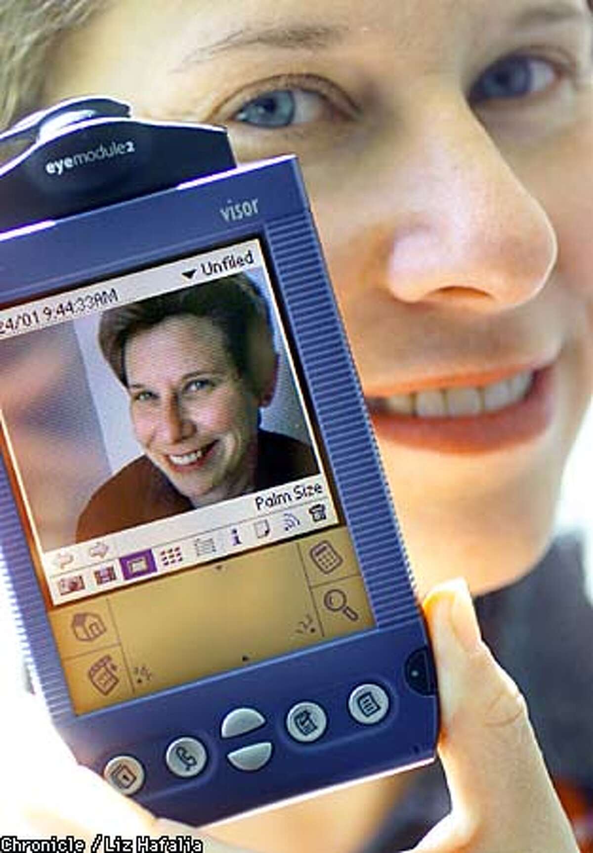 Handheld and Hopeful / Money-losing Handspring sees potential in ...