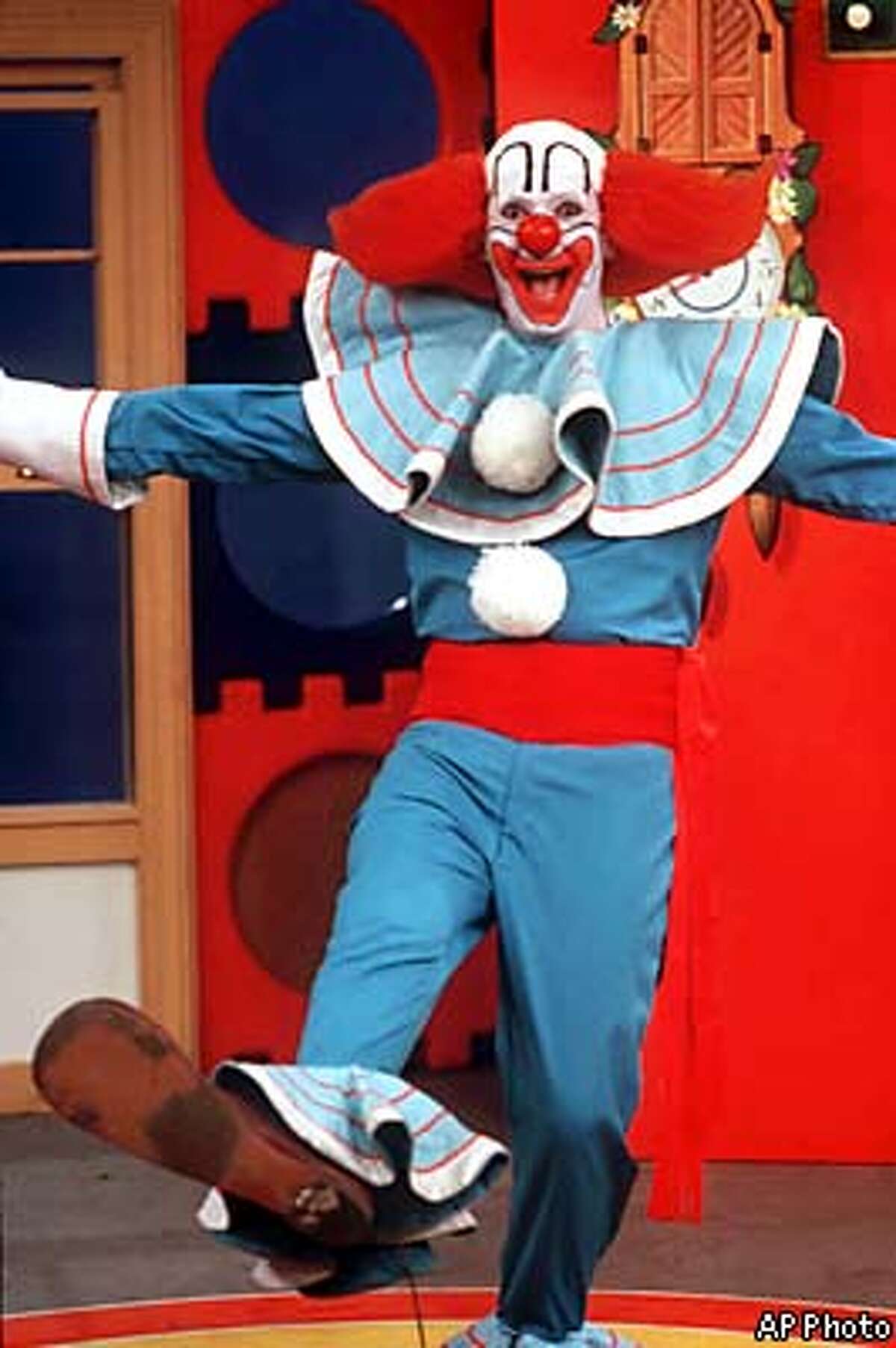 Time for a kiss -- send in the clown