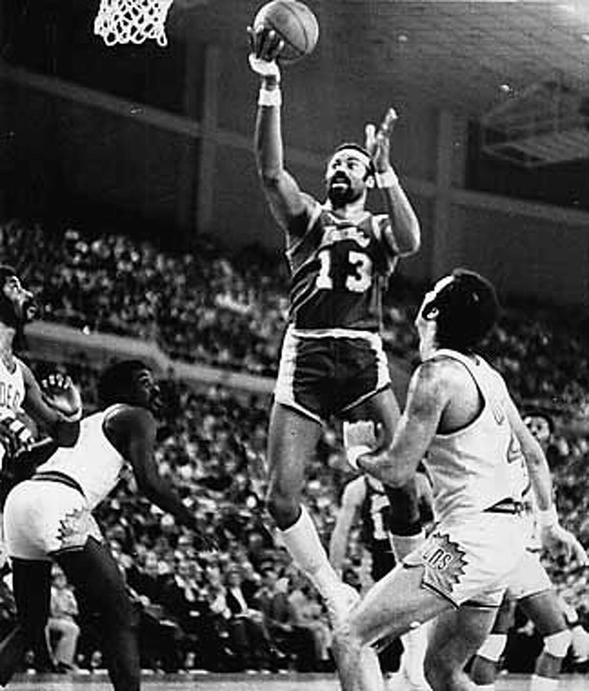 Basketball Legend Wilt Chamberlain Dies / Larger-than-life figure, both ...