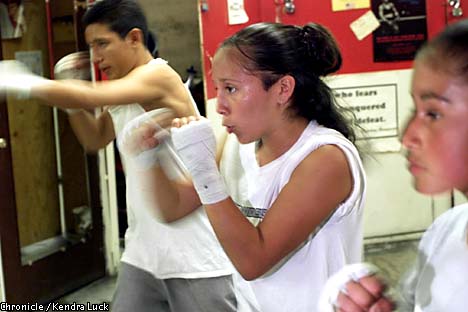 A jab at the ring brings out the fighter in her / Boxing is a hit with ...