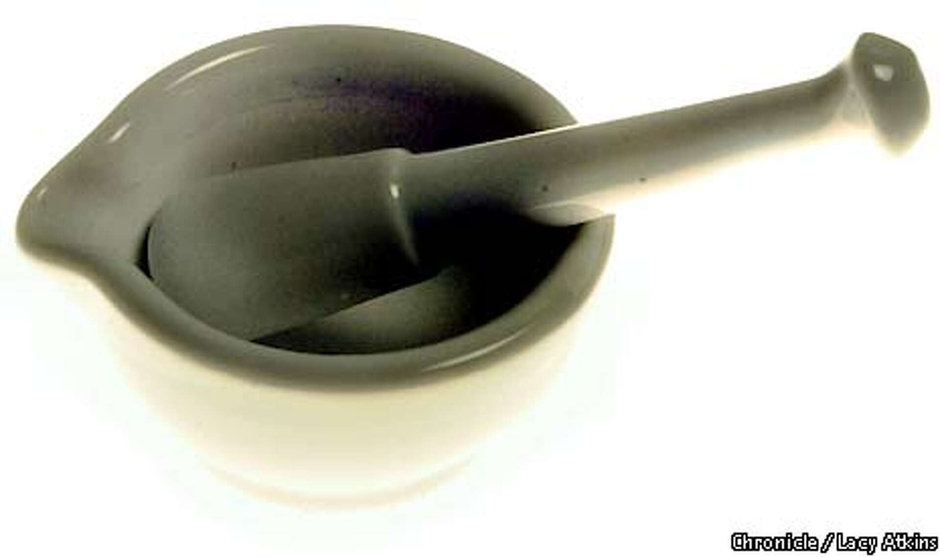 MORTAR POWER / Cooks sing the praises of a time-honored kitchen tool