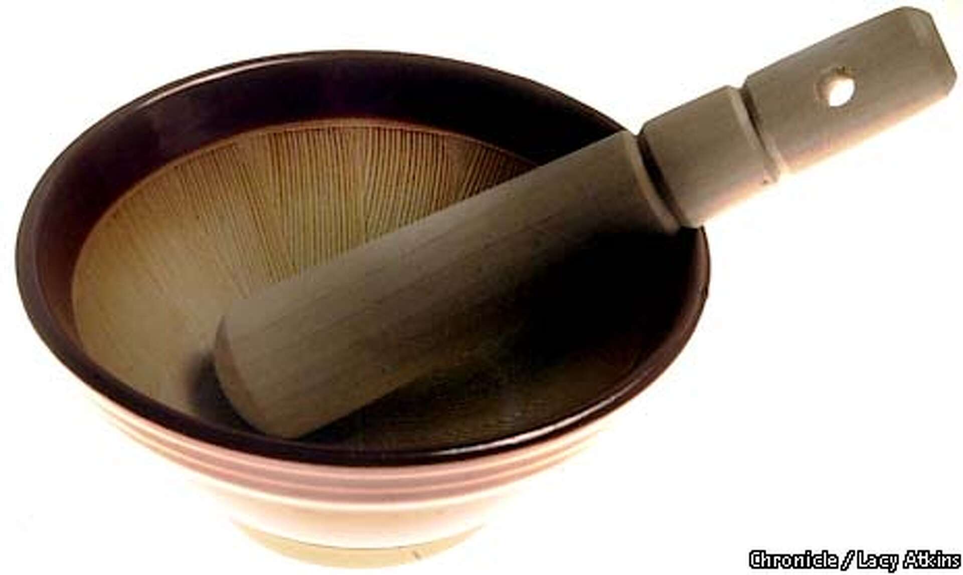 MORTAR POWER / Cooks sing the praises of a time-honored kitchen tool