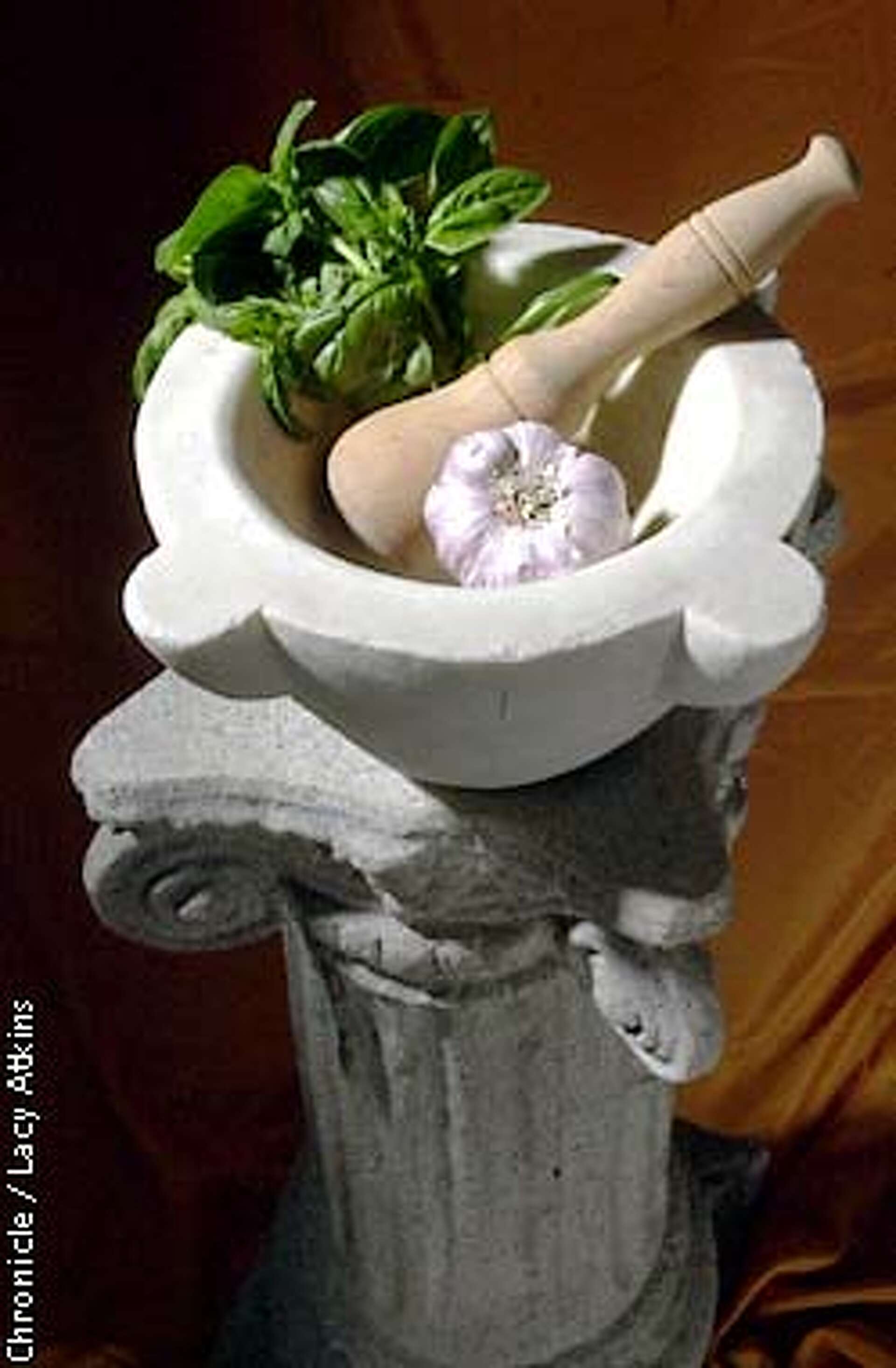 MORTAR POWER / Cooks sing the praises of a time-honored kitchen tool