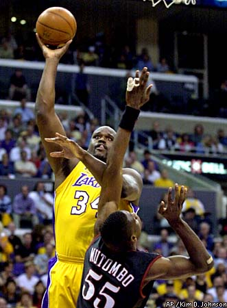 Shaq blocks the way / Rejection record helps Lakers even up Finals