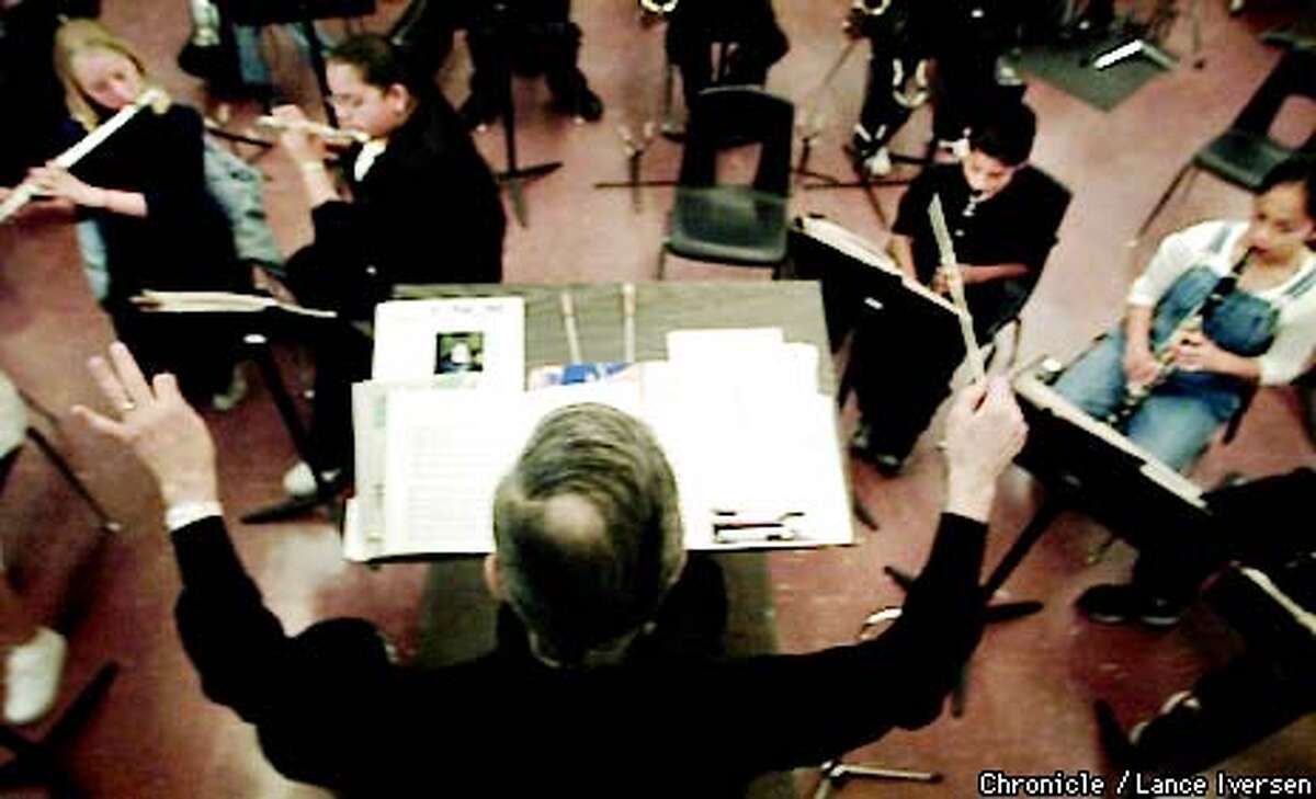 Making music / Middle school maestro has been telling students to play ...