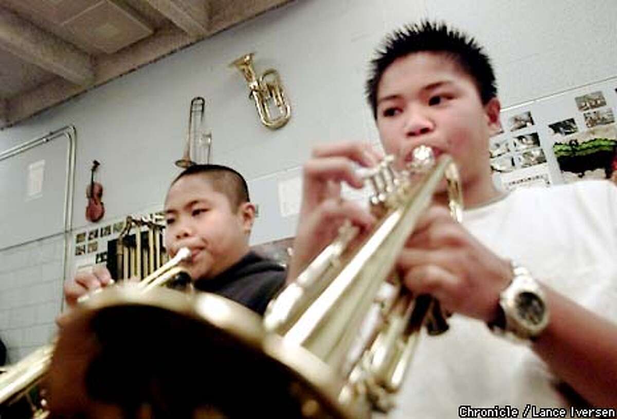 Making music / Middle school maestro has been telling students to play ...