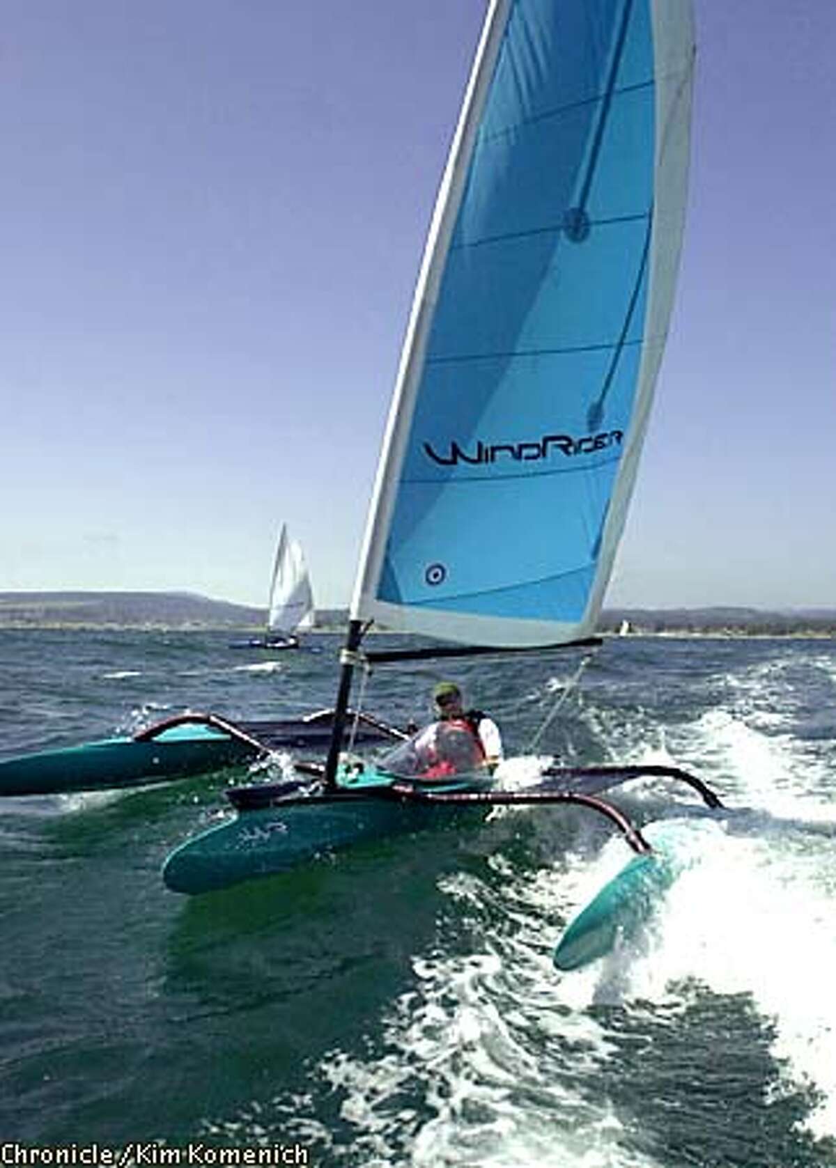 A tussle between man, trimaran and sea / Humpbacks, big swells ...