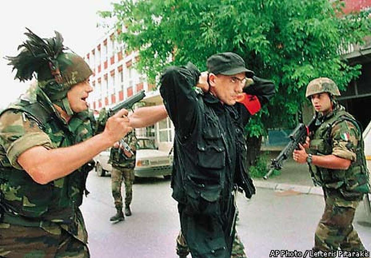 Kosovo Sinking into Chaos / Marines fired on again as violence flares ...