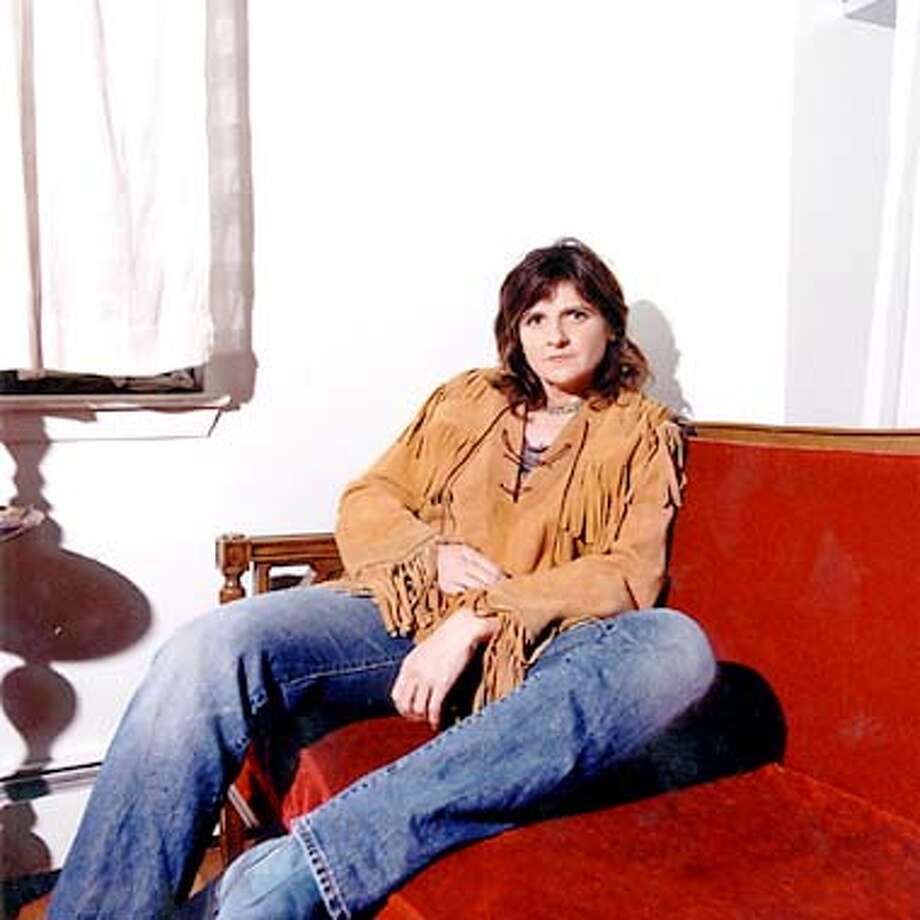Out of the blue / Indigo Girl Amy Ray strikes out on her own with punk ...