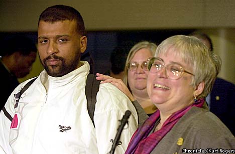 Freed hostage returns to Oakland