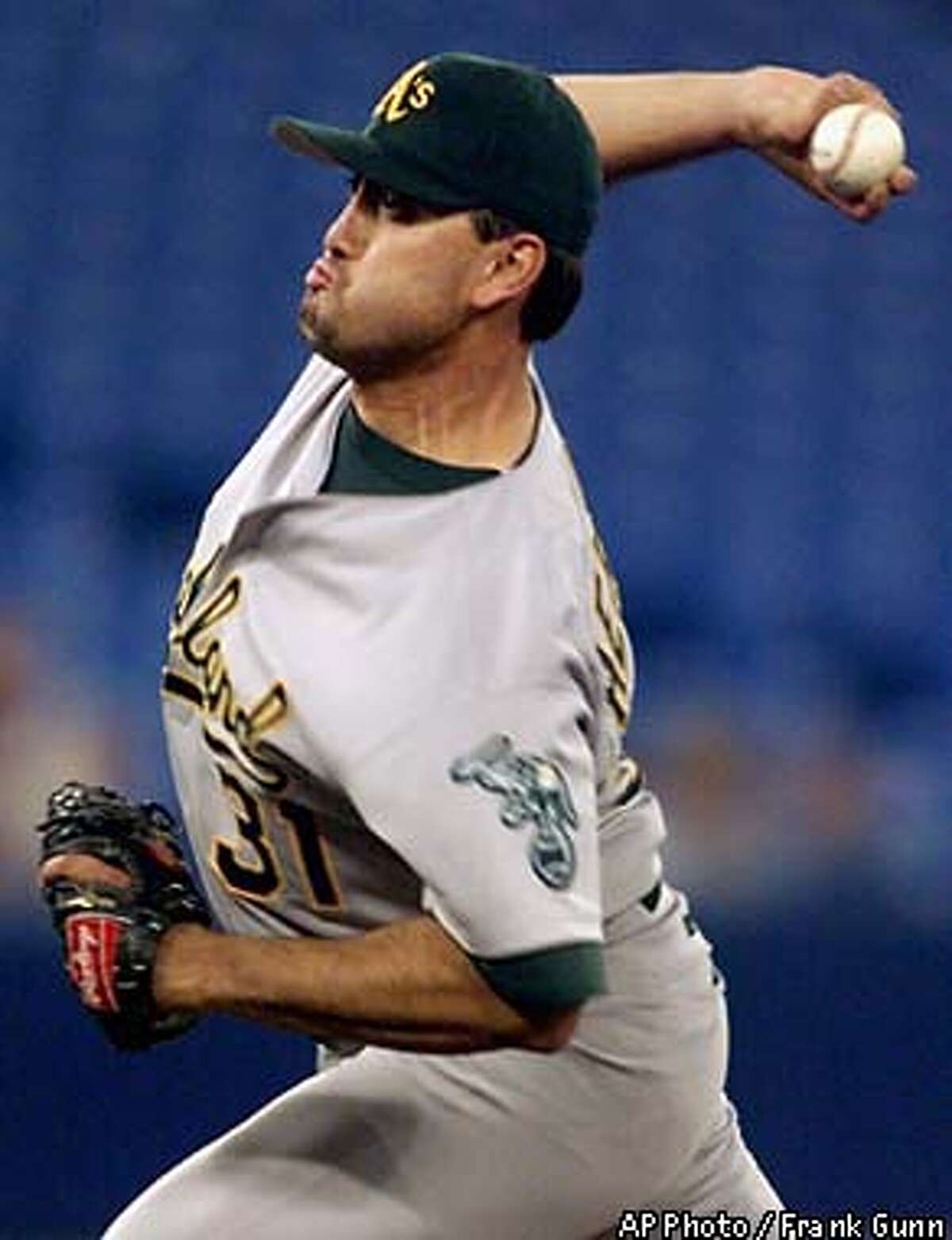 Heredia, Relievers Key A's Fifth Straight Win