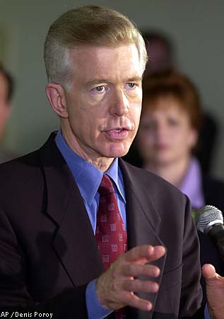 Davis' Pledges Come Back To Haunt Him