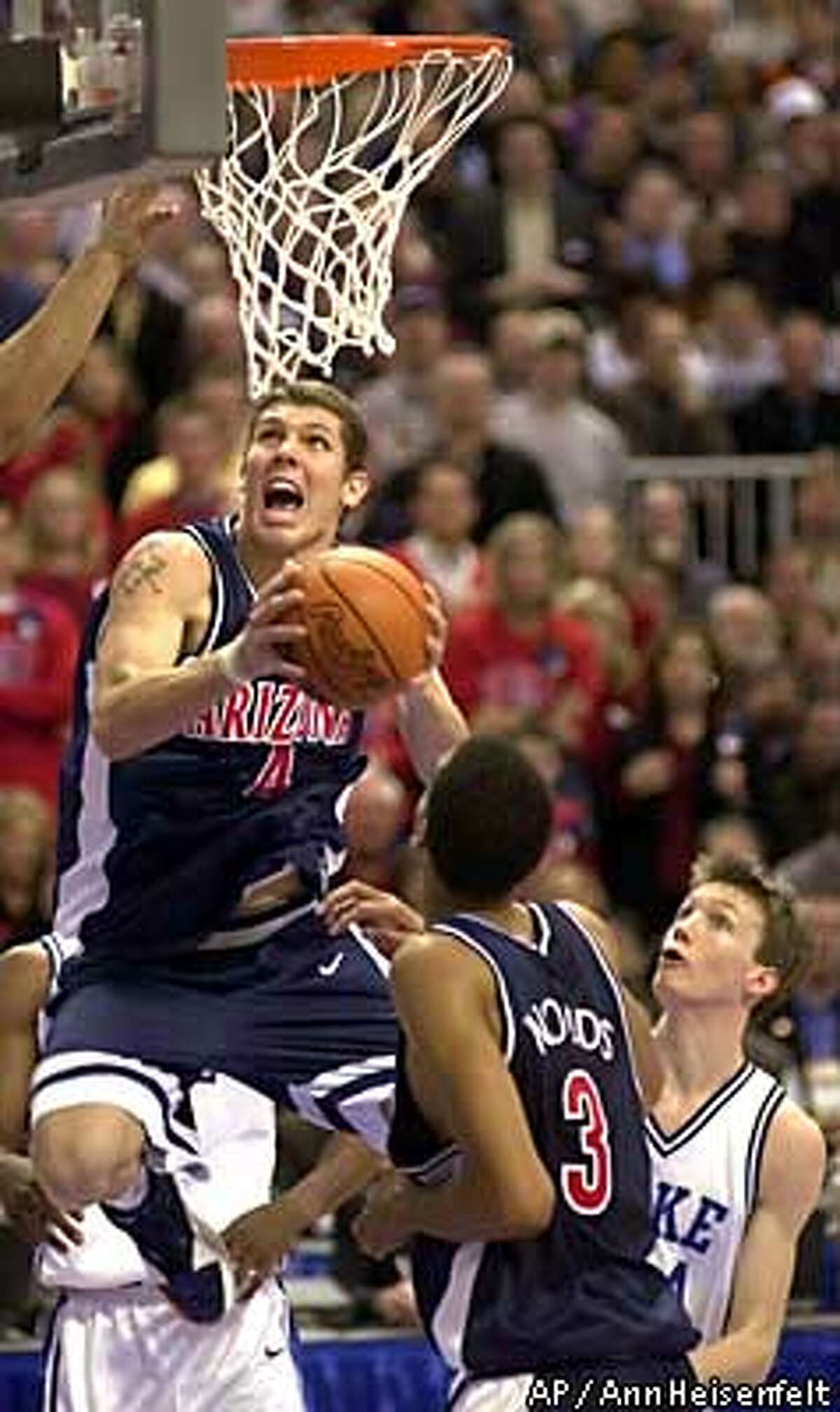 Duke Reigns Supreme in NCAA / Crucial 3-pointers lift Devils to third crown