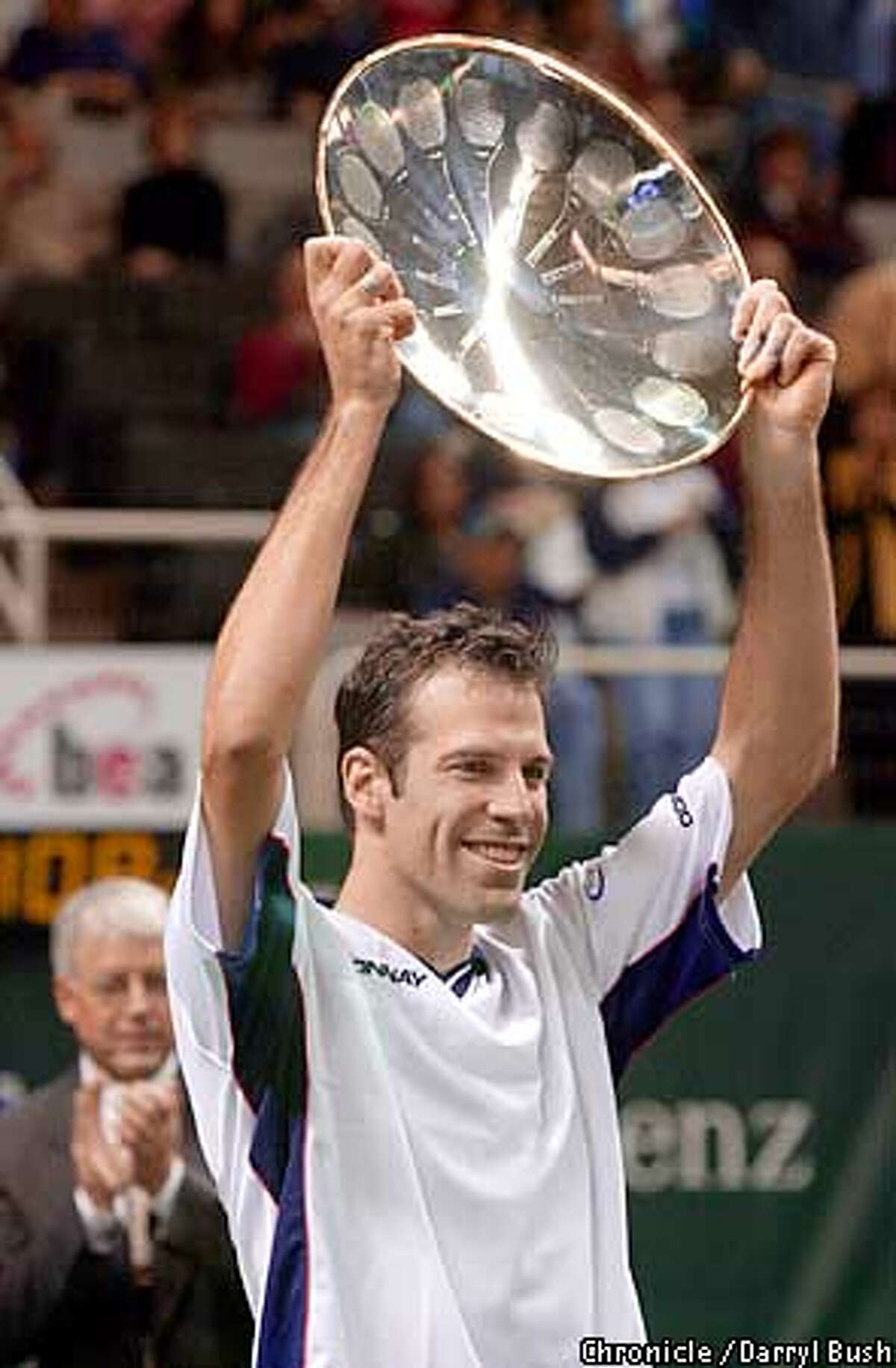 Rusedski Solves Agassi / Briton changes speed on serve to win Sybase final