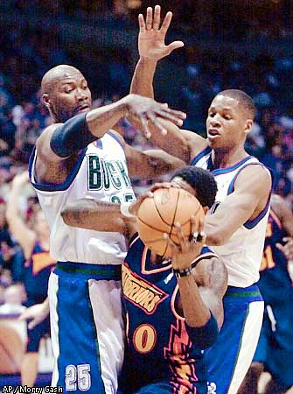 Bucks' Big Dog Has His Day / Robinson pours in 45 points as Warriors ...