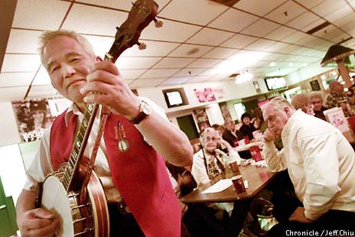 Picking and Grinning / The Peninsula Banjo Band keeps its music alive ...