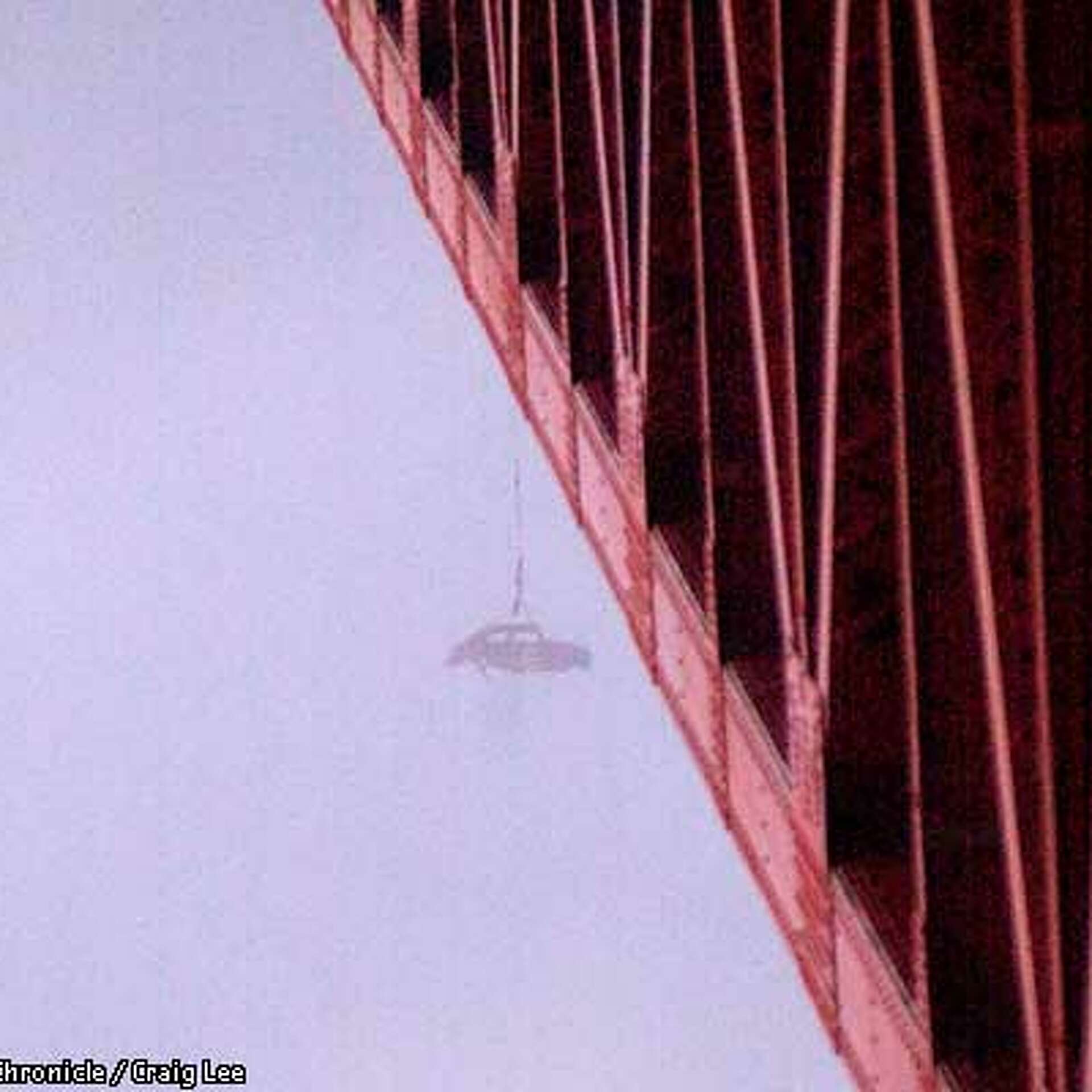 Beetle Overboard! / VW hung off GG Bridge in prank